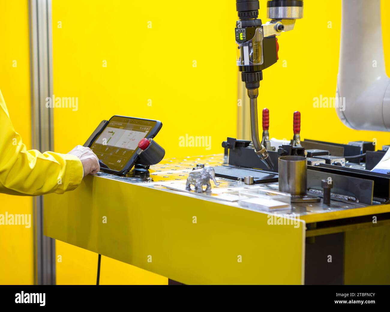 Industrial mechanical technician control robot arc welding Stock Photo ...