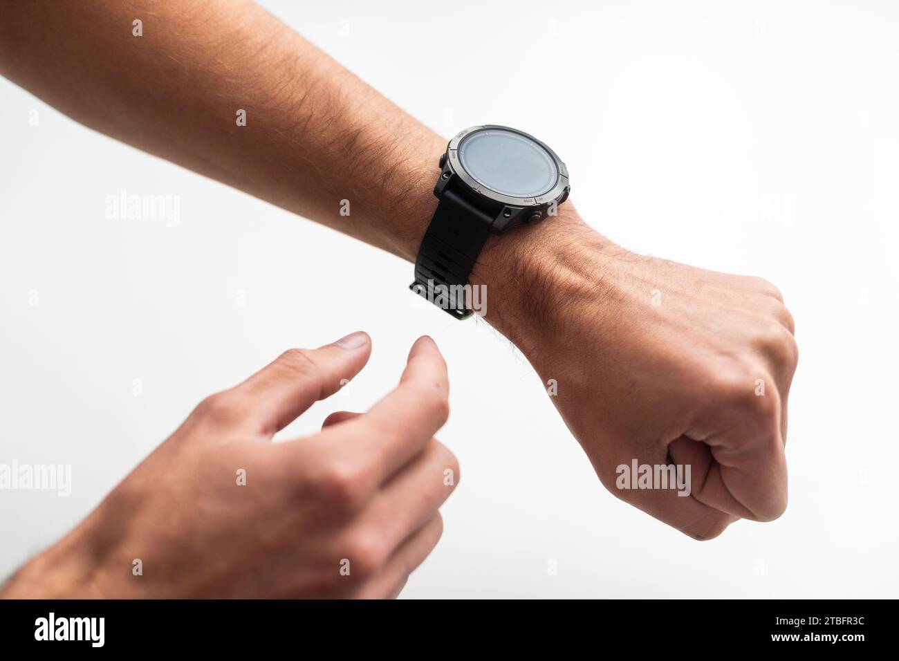 Isolated male hand with smart watch with blank screen, white background ...