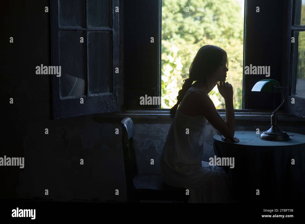 Woman with depressed mood, home alone Stock Photo - Alamy