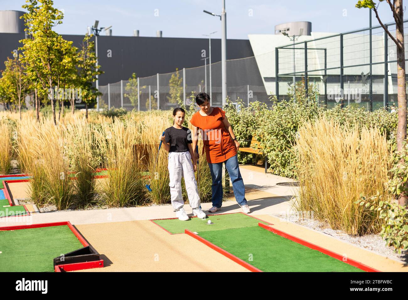 Cute boy playing golf hi-res stock photography and images - Alamy