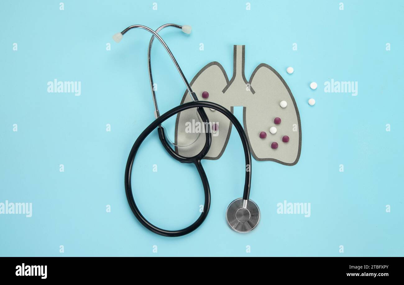 Lungs paper decorative model with medical stethoscope on blue ...