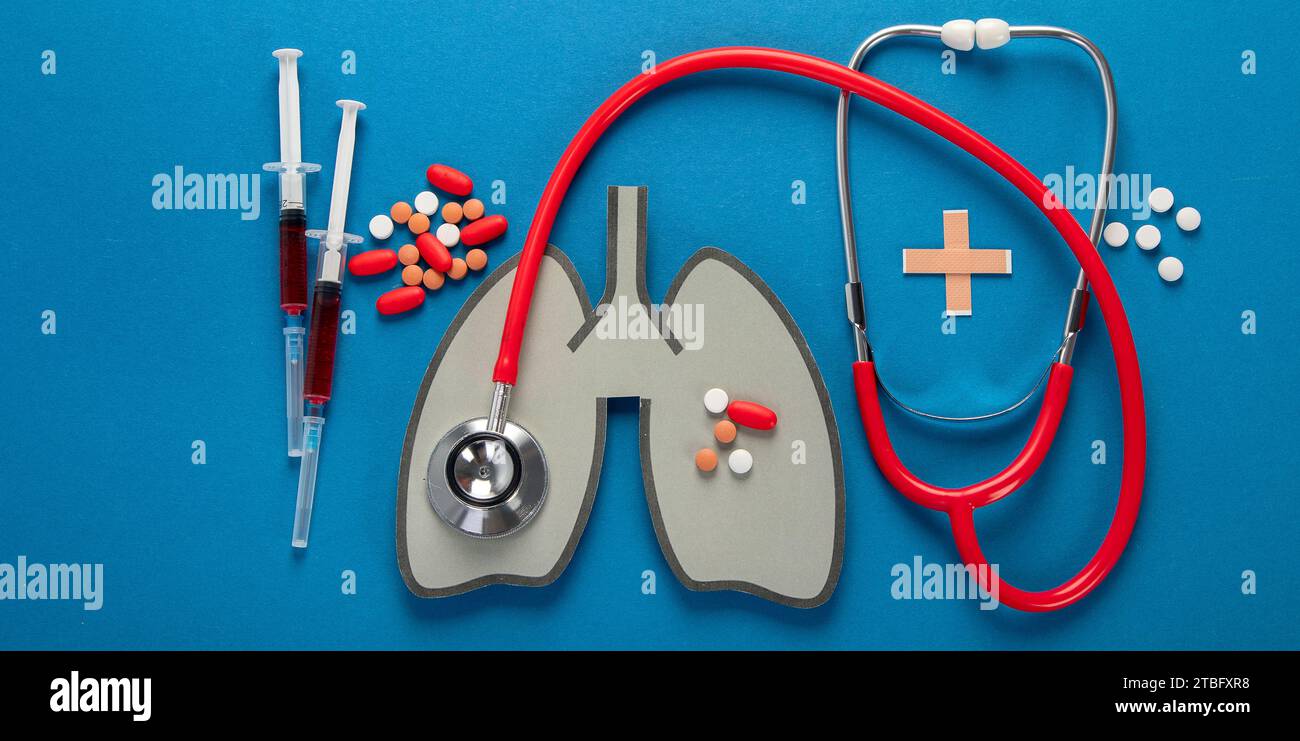 Lungs paper decorative model with medical stethoscope on blue ...