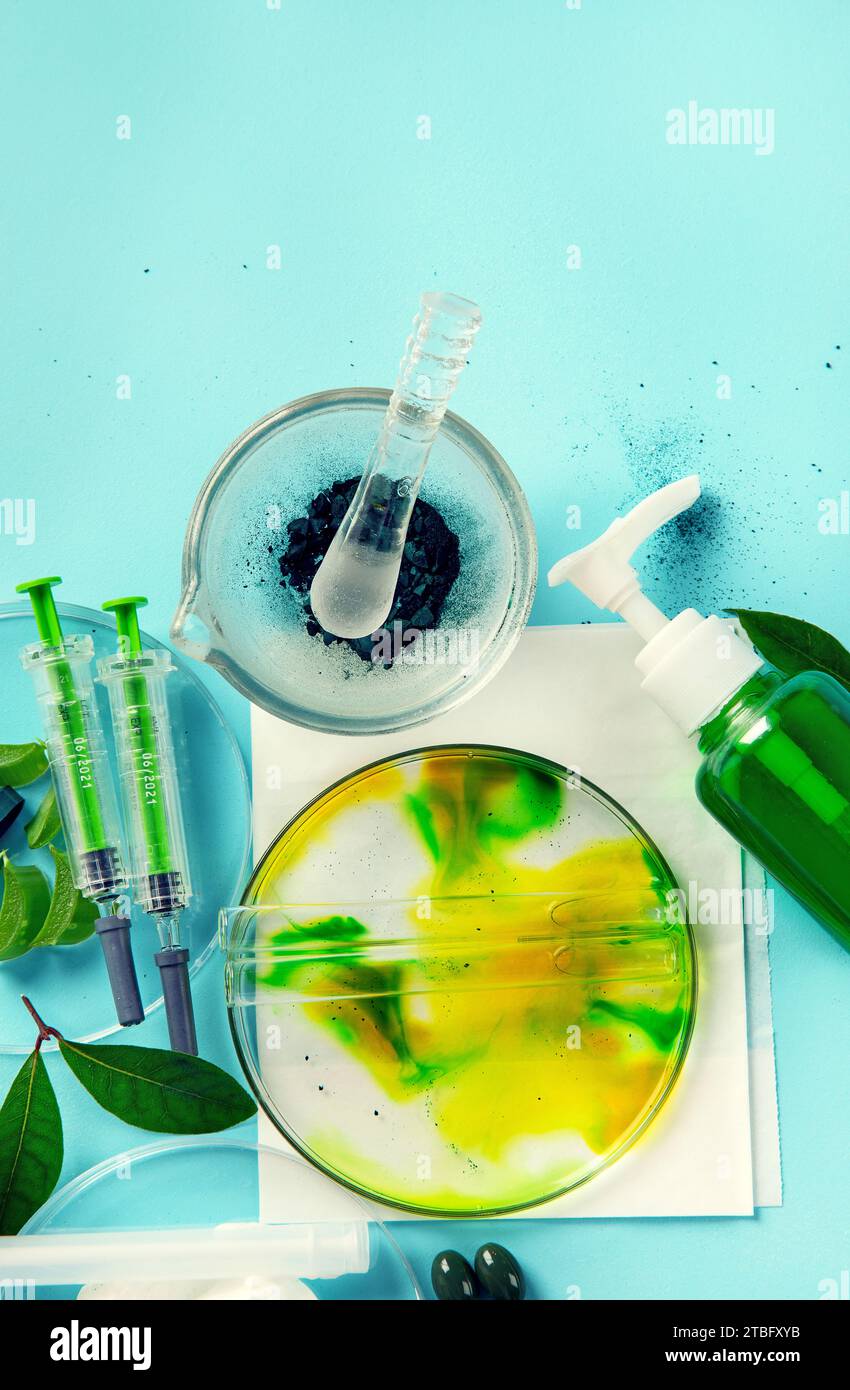 Cosmetic laboratory research on blue background. Beauty concept Stock ...