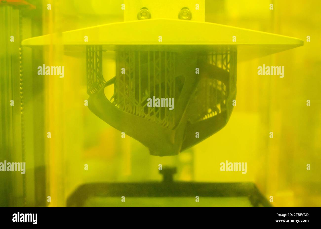 Printed models on 3D printer close-up. Objects printed on photopolymer ...