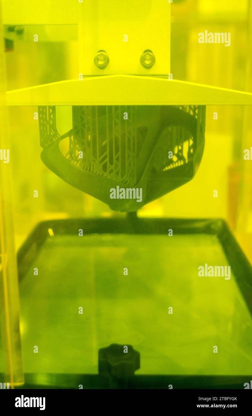 Printed models on 3D printer close-up. Objects printed on photopolymer ...