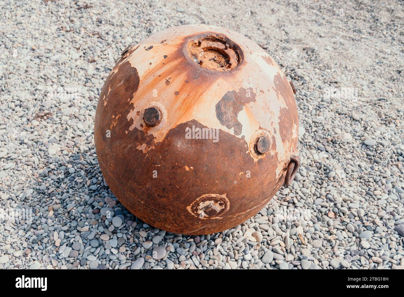 Old rusty sea mine on the beach Stock Photo - Alamy