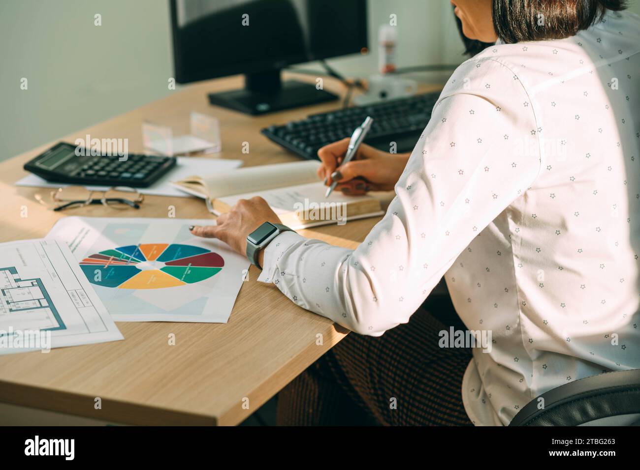 Blueprints of Efficiency: Office Worker's Hands Dive into Data and ...