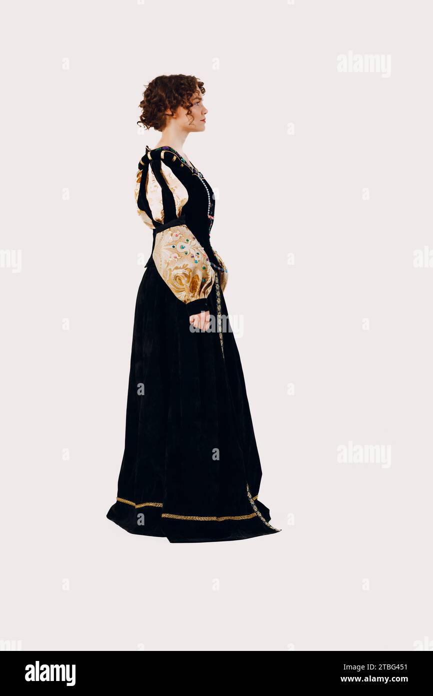 Portrait of a young aristocratic woman dressed in a medieval dress on ...