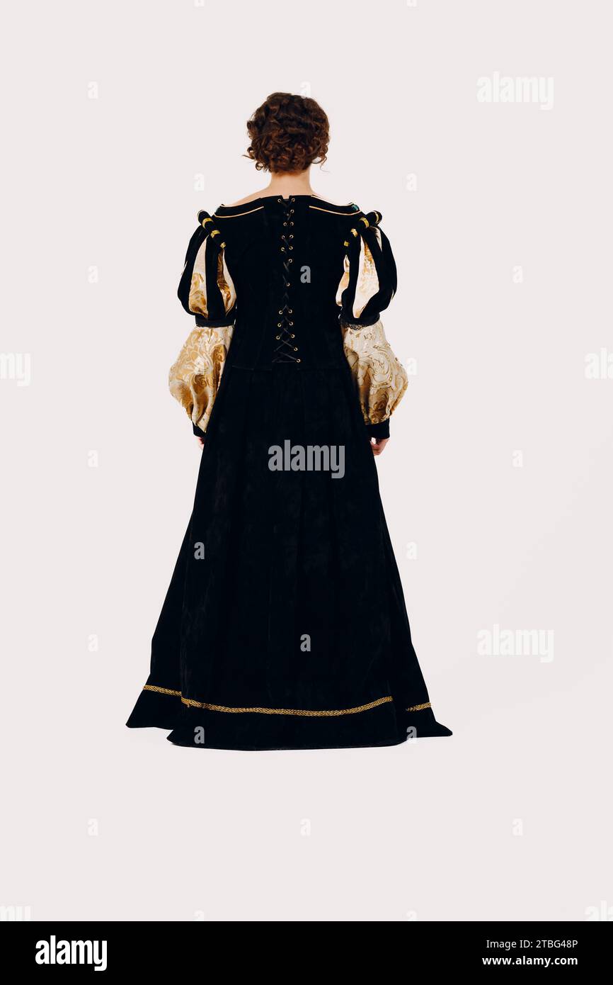 Portrait of a young aristocratic woman dressed in a medieval dress on ...