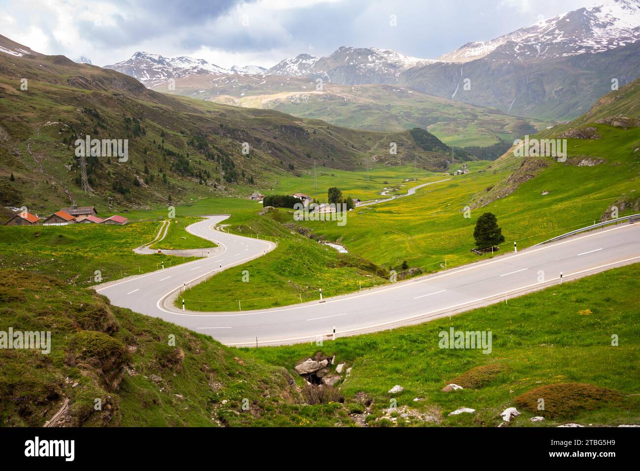 Winding road in Swiss alps, scenic mountain drive Stock Photo - Alamy