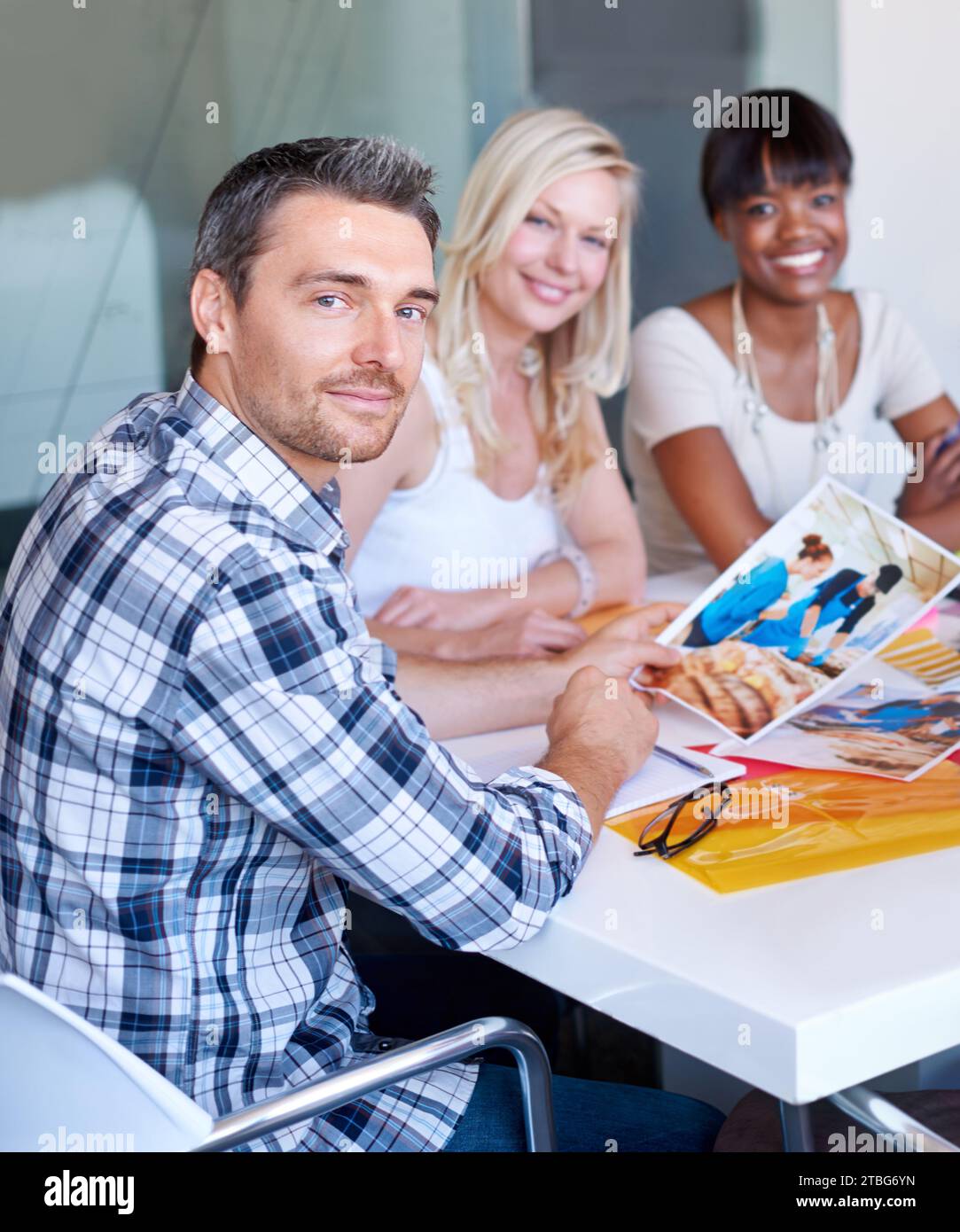 Portrait, man and creative team for brainstorming in office with ...