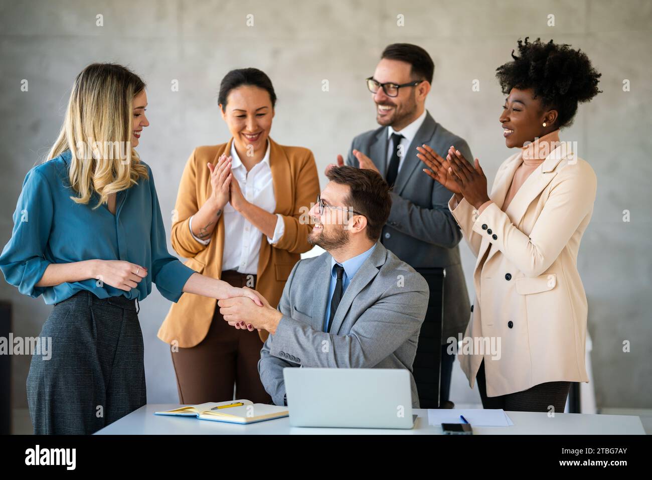 Nice to meet you in our team. Friendly man leader boss shake hand of ...