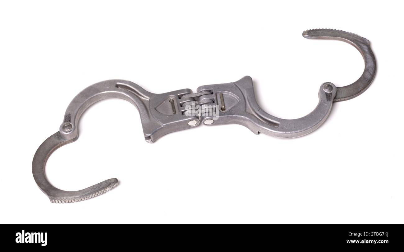Modern strong handcuffs isolated on white background Stock Photo - Alamy
