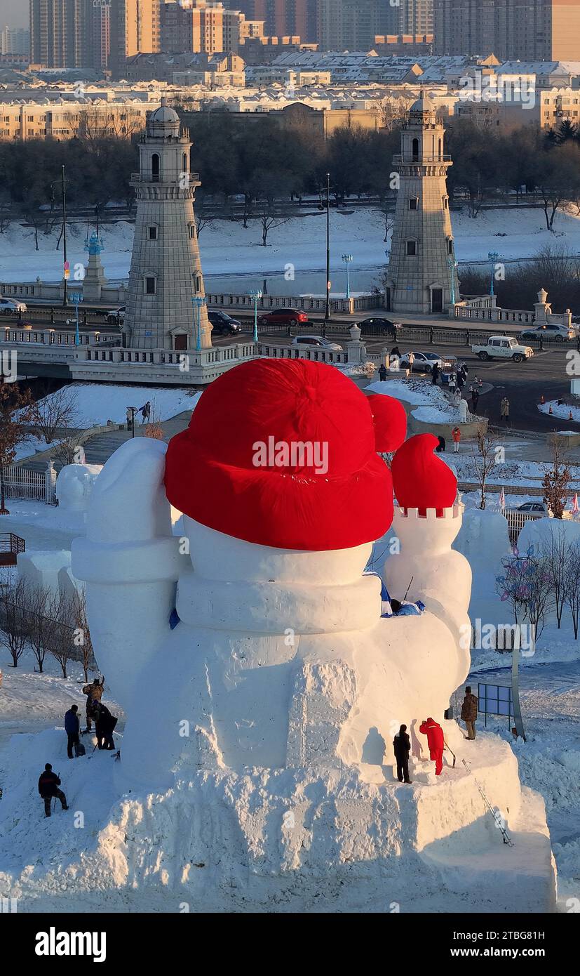 A landmark snowman draws tourists in Harbin City, northeast China's ...
