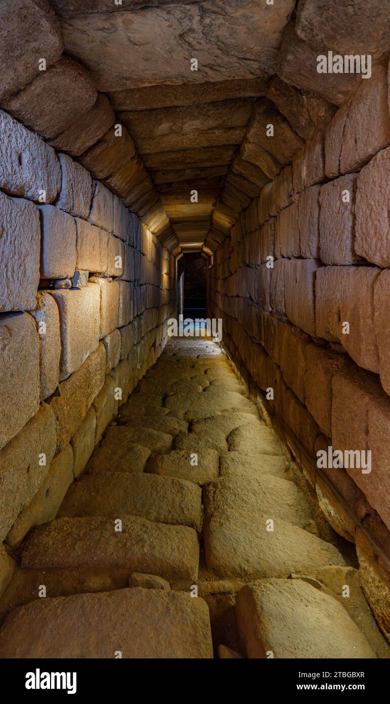 Hallway with stone block stairs and vaulted ceiling leading to the ...