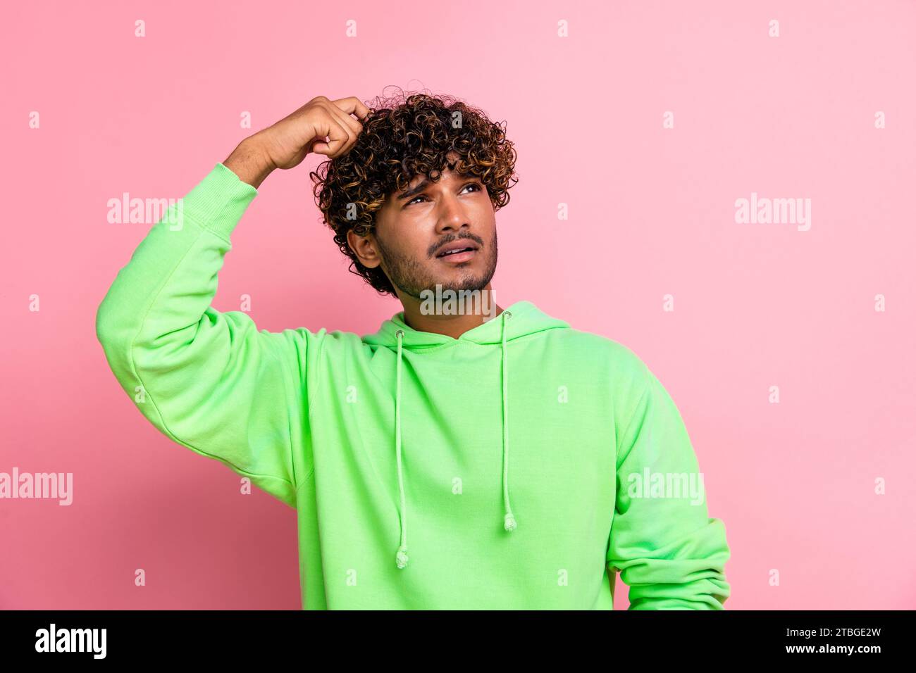 Portrait of thoughtful indian student wavy hair man scratch head ...