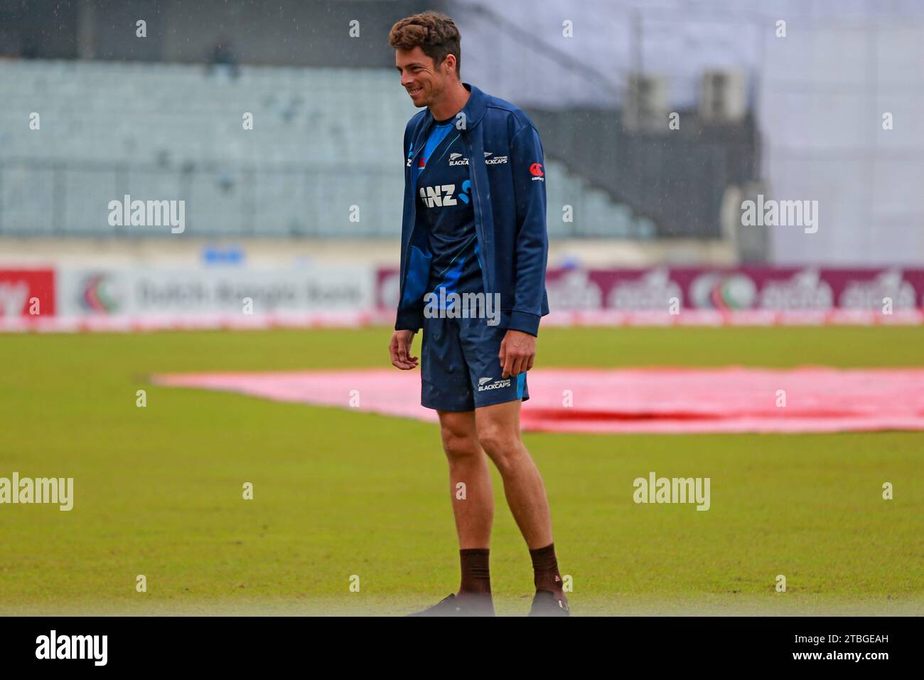 New Zealand spinner Mitchell Santner looks on the field as continuous ...