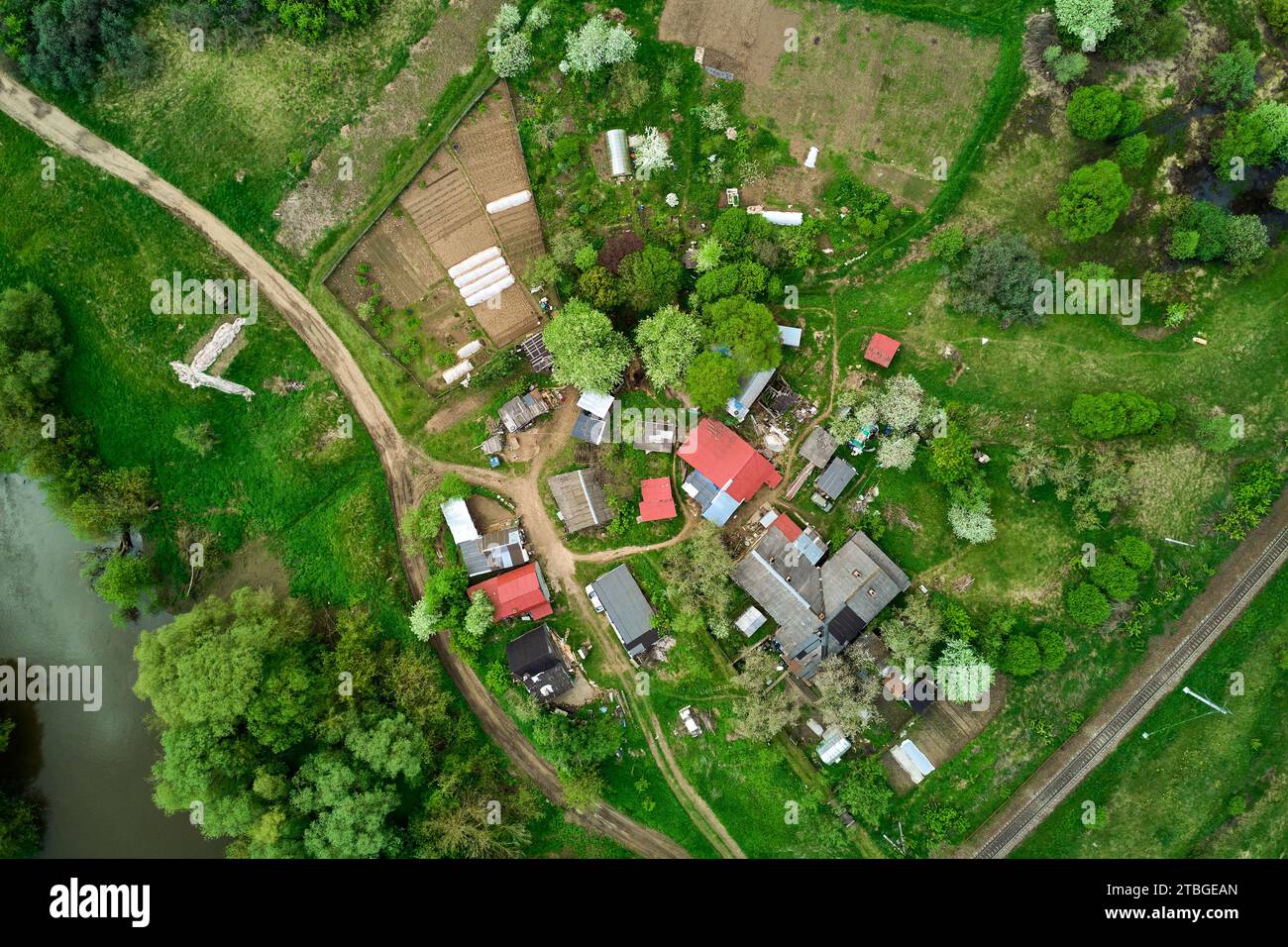 Top view of a small peasant farm with village houses and vegetable ...