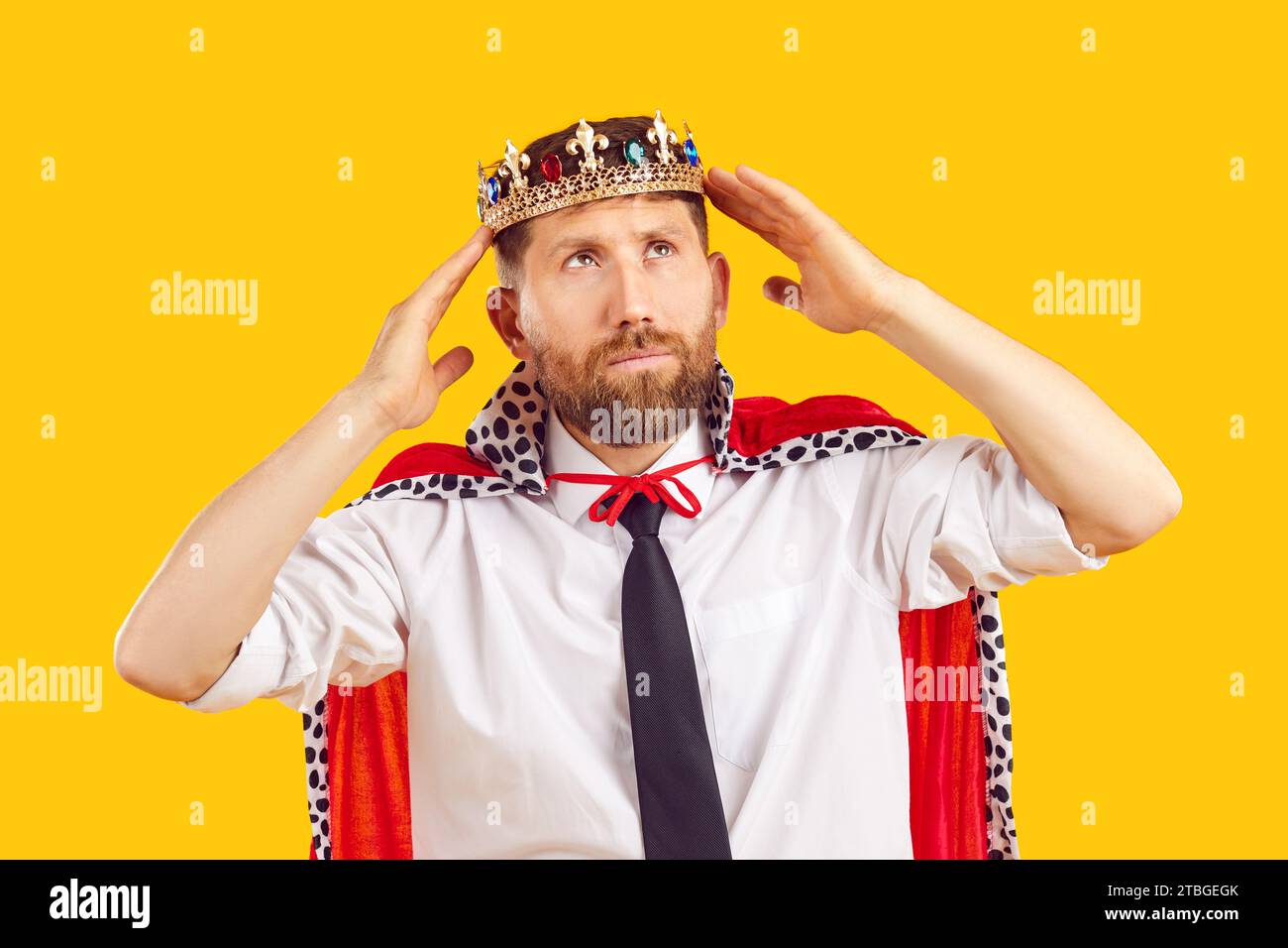 Corporate employee in king's crown and office shirt dreams of getting ...