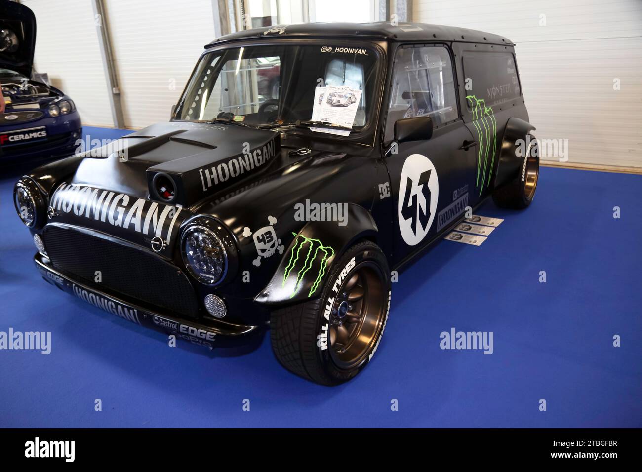 Three-quarters front view of a Hoonigan Minivan, as a tribute to the ...