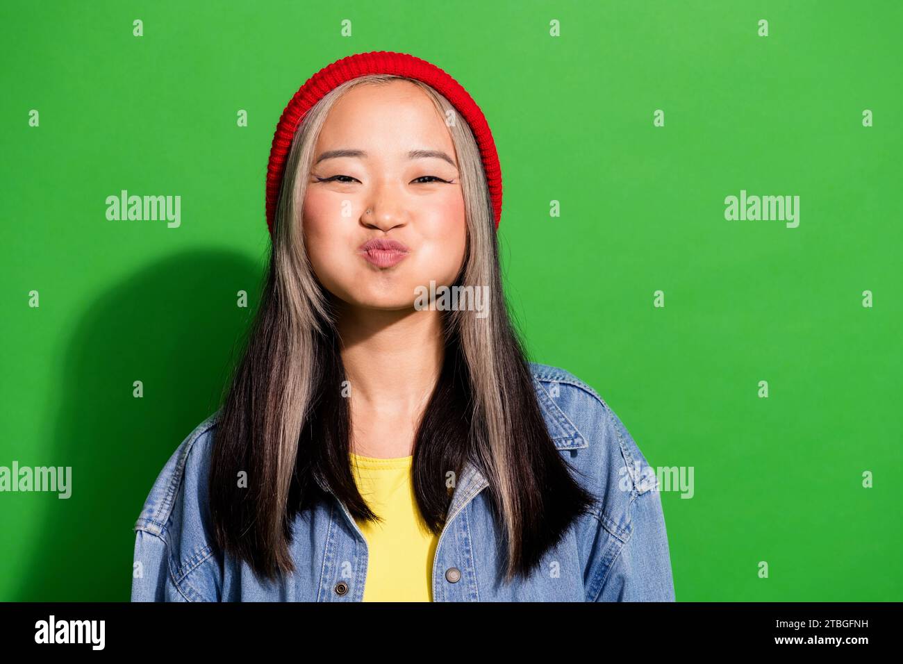 Photo portrait of pretty young girl charming smile inflate cheeks wear ...