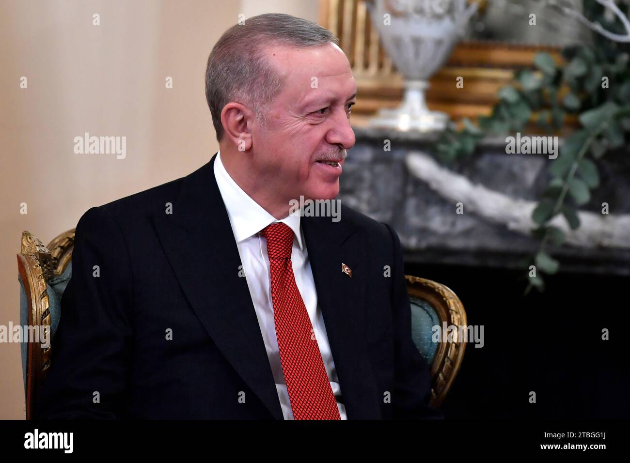 Turkish President Recep Tayyip Erdogan smiles during a meeting with ...