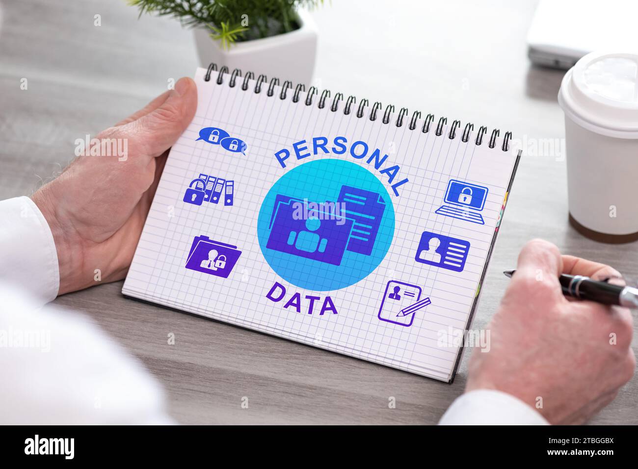 Hand holding a notepad with personal data concept Stock Photo - Alamy