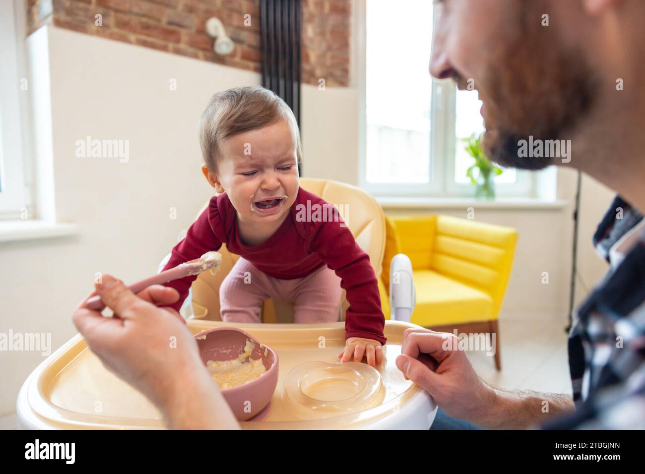 Baby crying food feeding hi-res stock photography and images - Alamy