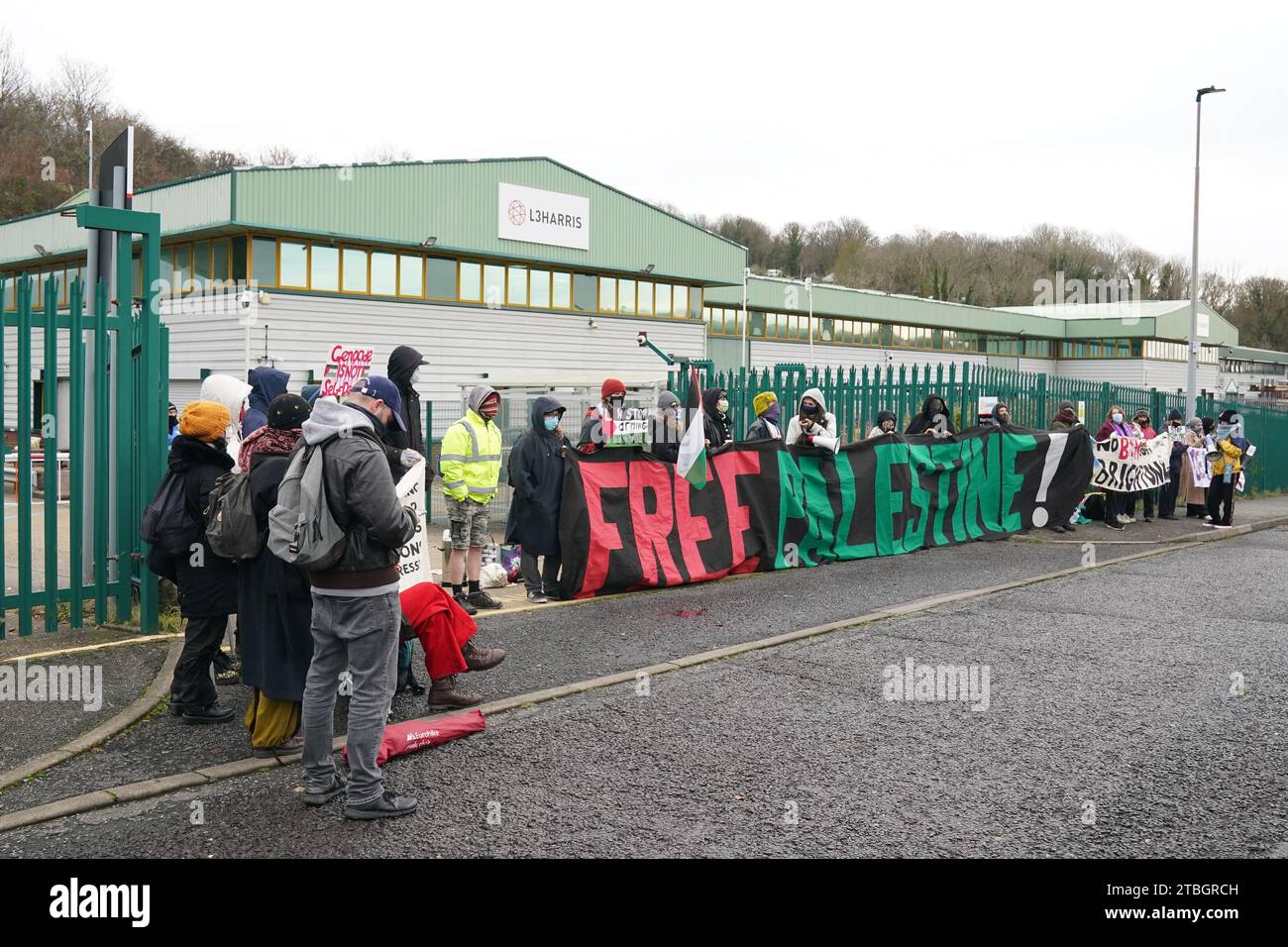Protesters form a blockade outside L3Harris factory in Brighton, as ...
