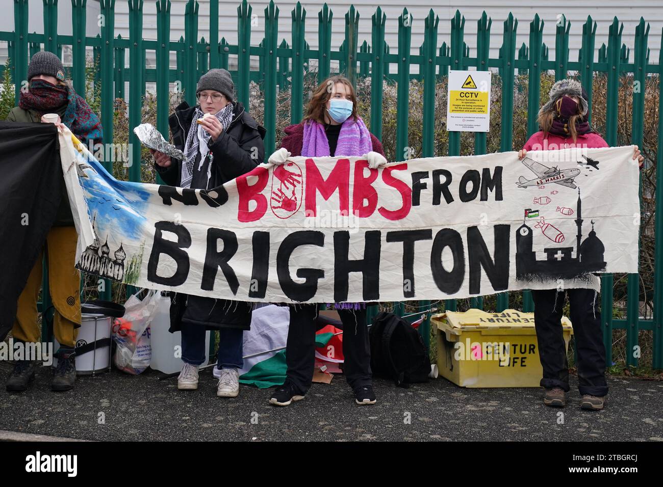 Protesters form a blockade outside L3Harris factory in Brighton, as ...