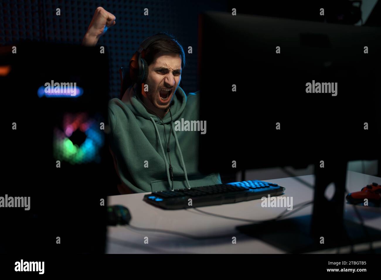 Gamer celebrating success young hi-res stock photography and images - Alamy