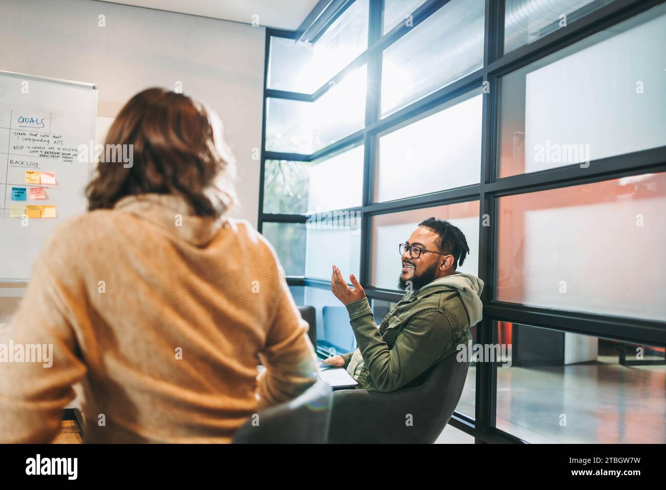 Office members brainstorming in company hi-res stock photography and ...