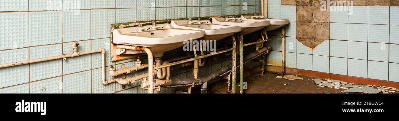 Panorama Old sinks in an abandoned factory Stock Photo - Alamy