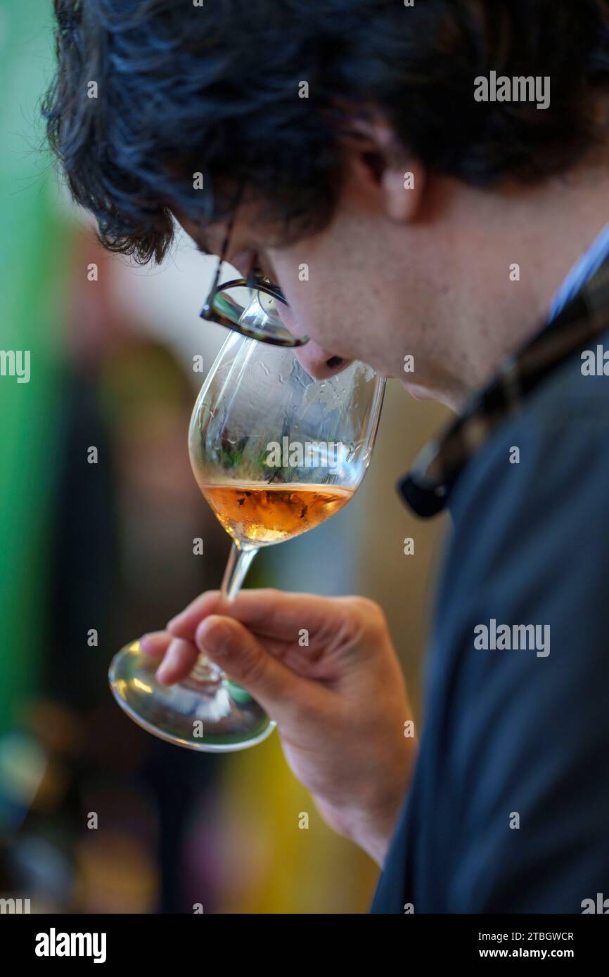 Person smelling glass of wine during a wine tasting session Stock Photo ...