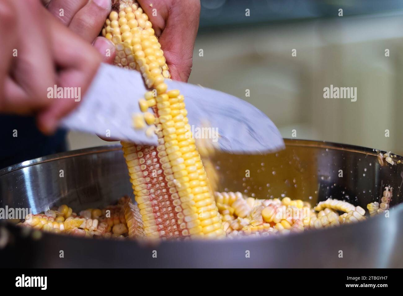 Artisanal preparation of corn cachapas, a typical Venezuelan dish Stock ...