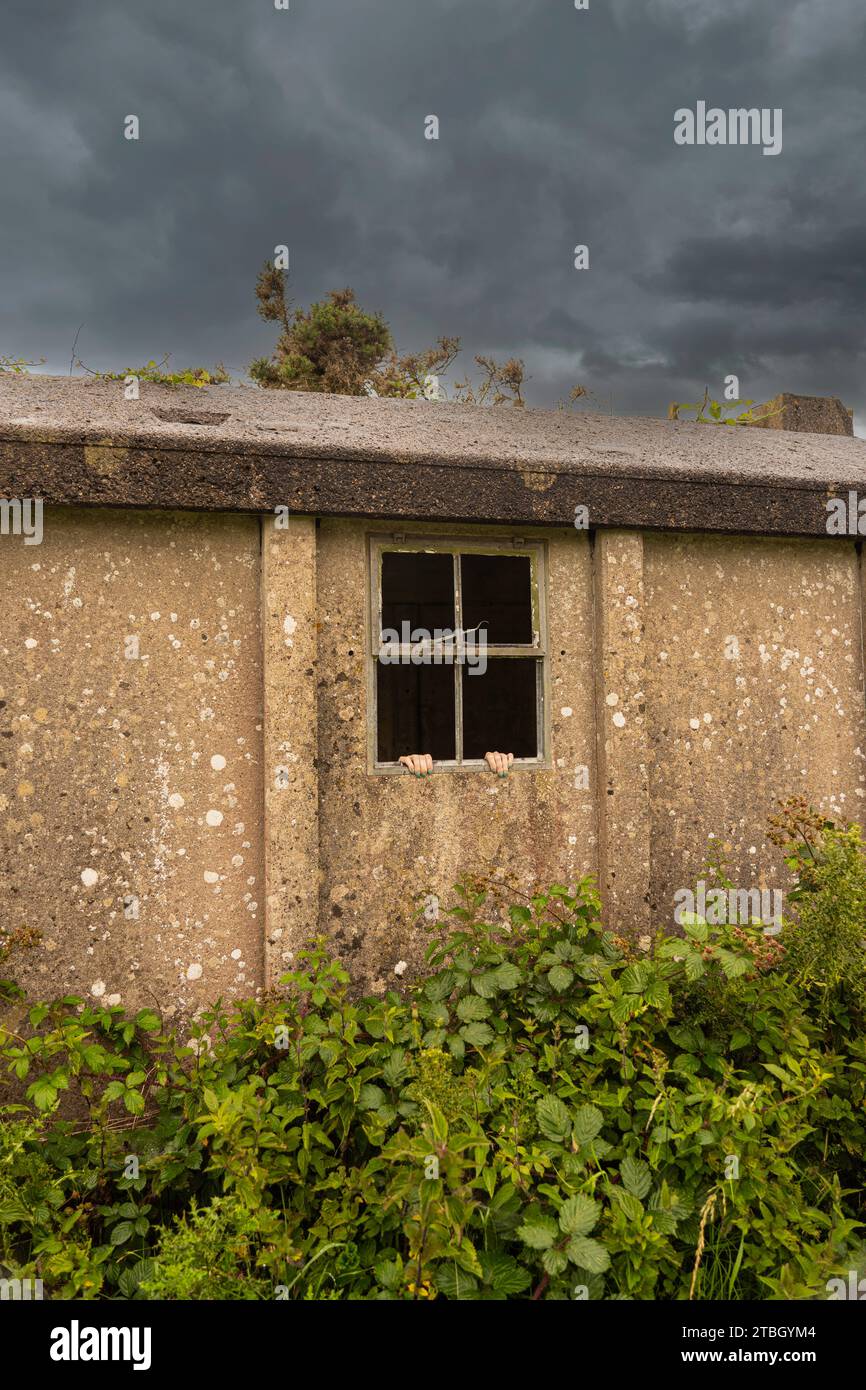 hands at the window of a derelict building at sourton, devon, uk Stock ...