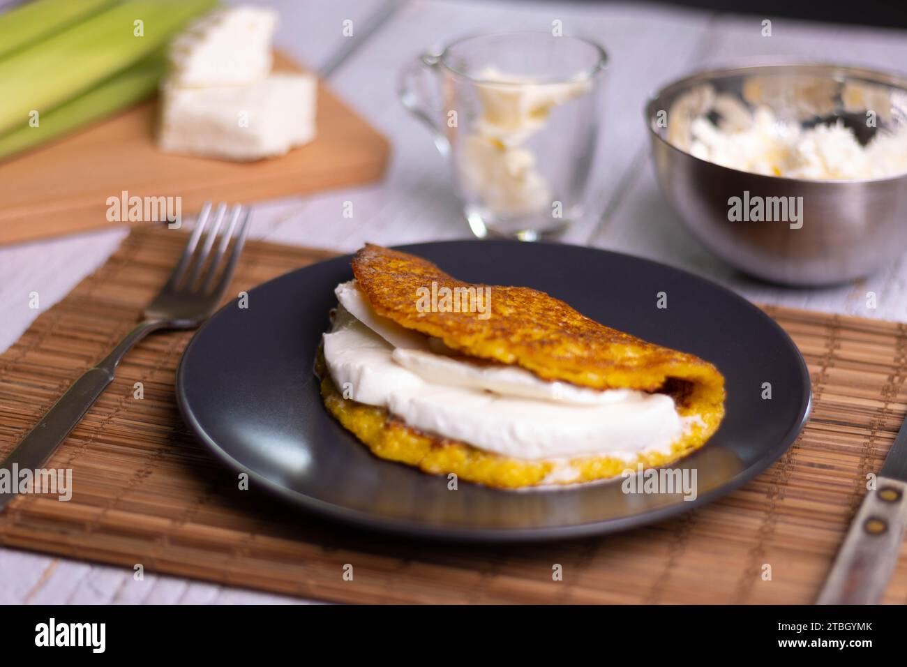 Corn cachapas with white cheese, typical Venezuelan dish Stock Photo ...
