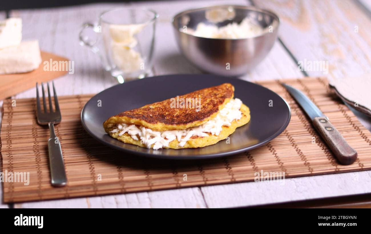 Corn cachapas with white cheese, typical Venezuelan dish Stock Photo ...