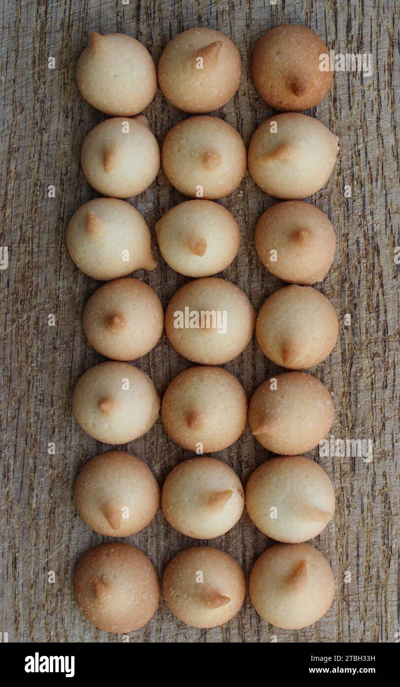 Mini Milk Biscuits Ae Laid Out In Three Even Rows On A Vintage Wooden ...