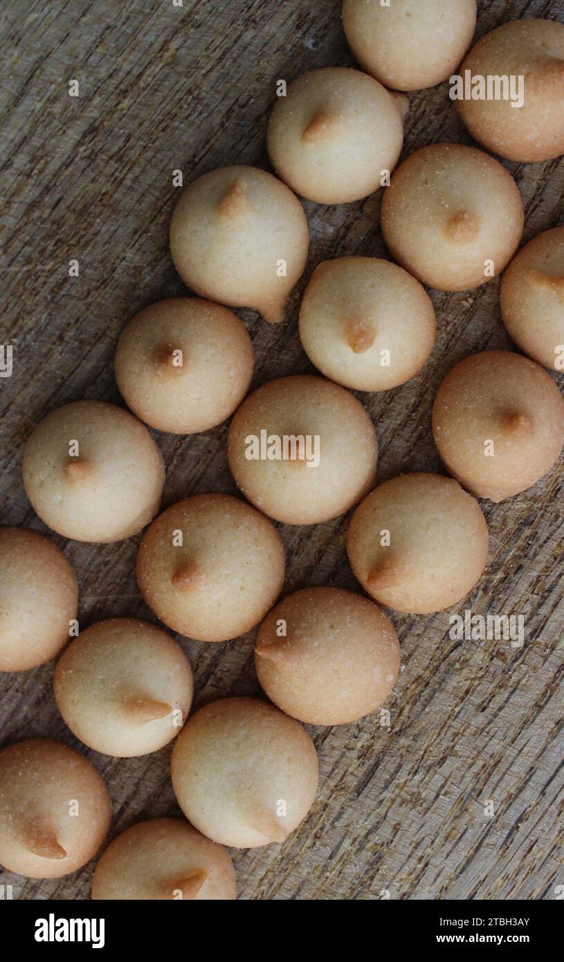 Concept Photo Of Wooden Bakery Board With Three Rows Of Small Round Egg ...