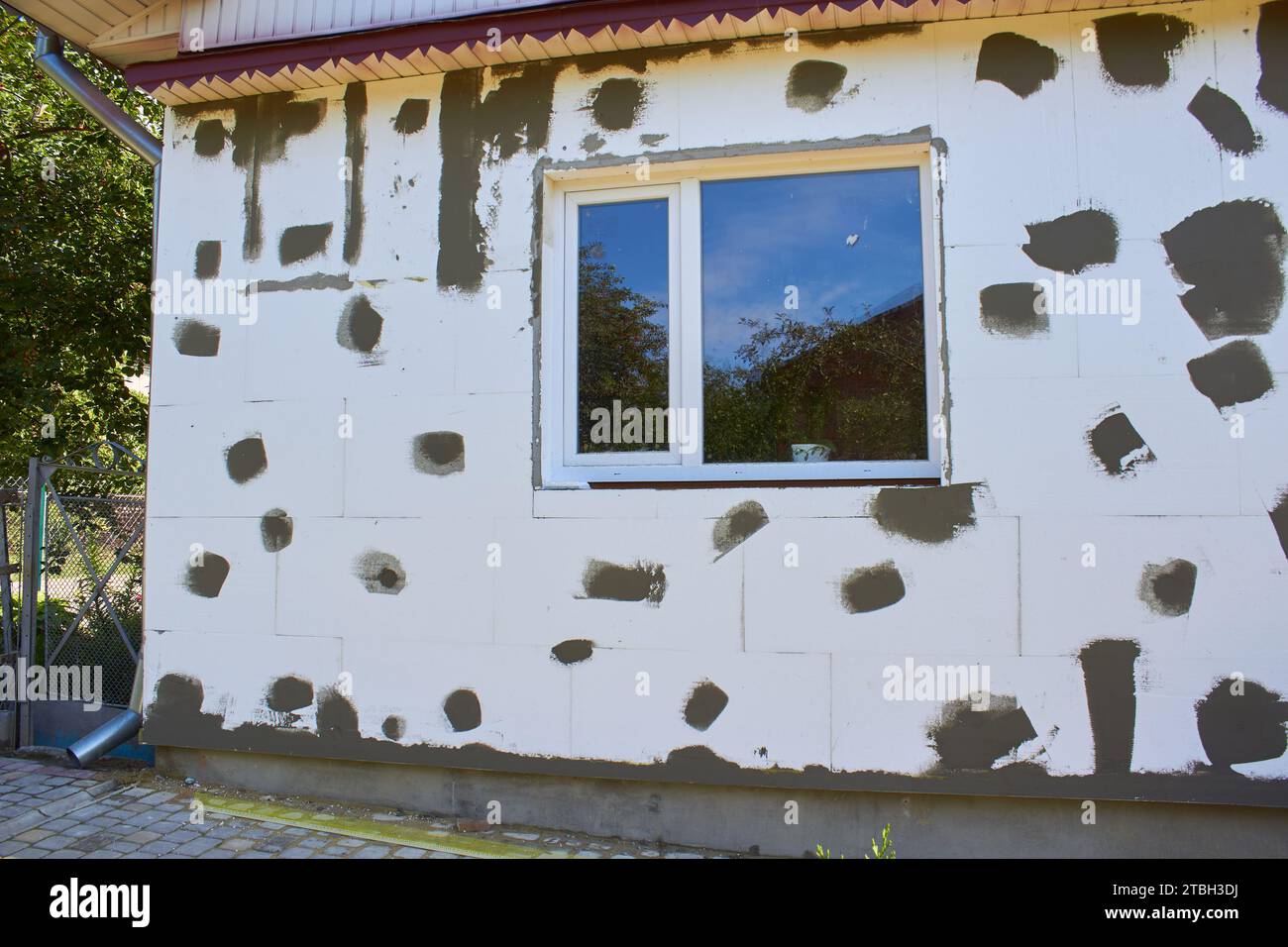 Polystyrene Insulation Of Facade Styrofoam house with a window Stock ...