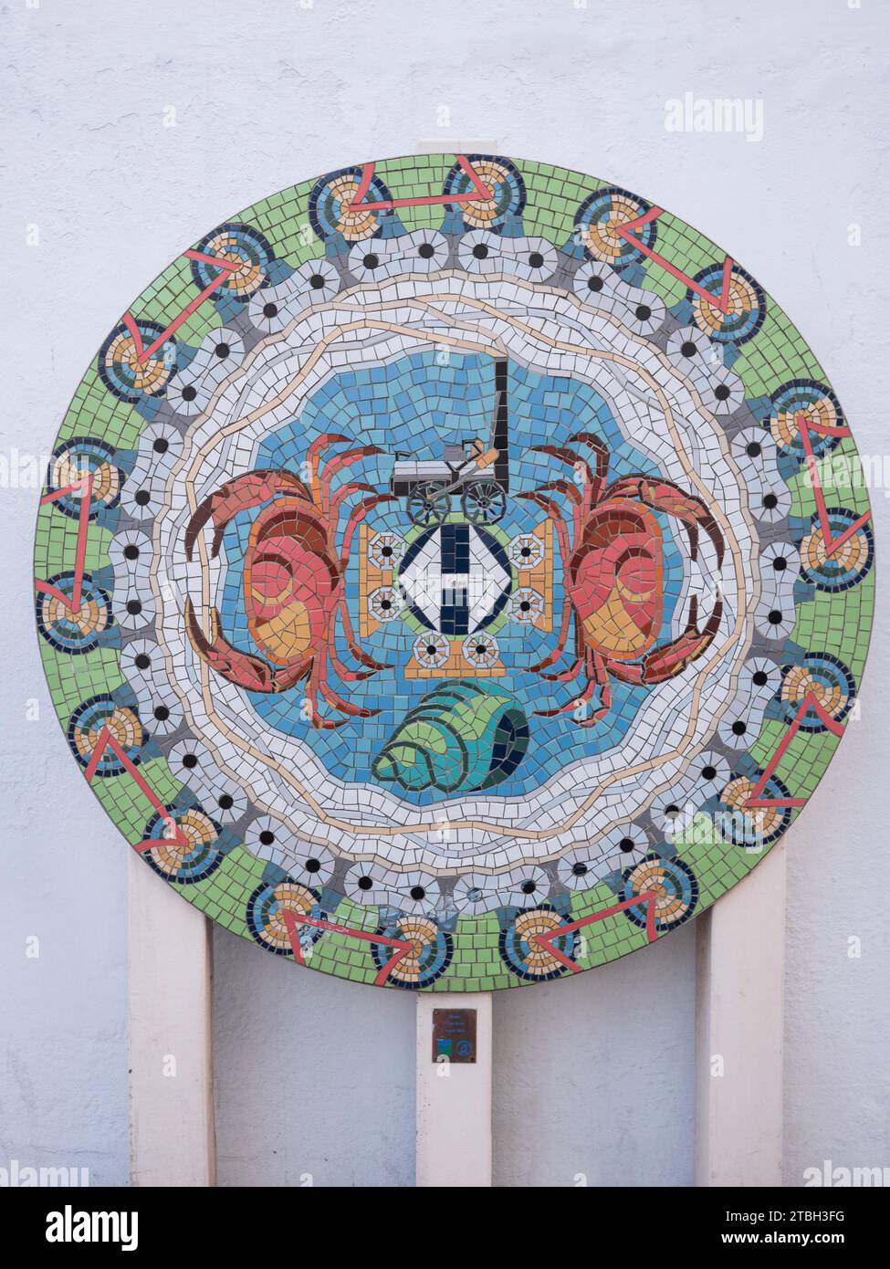 a Circular mosaic of the Crab and winkle line in Whitstable Kent UK ...