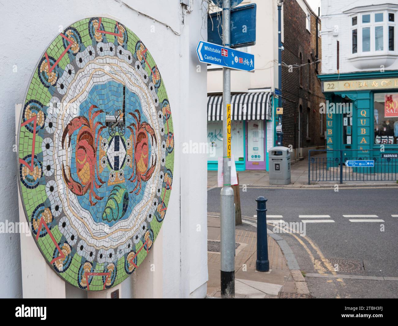 a Circular mosaic of the Crab and winkle line in Whitstable Kent UK ...