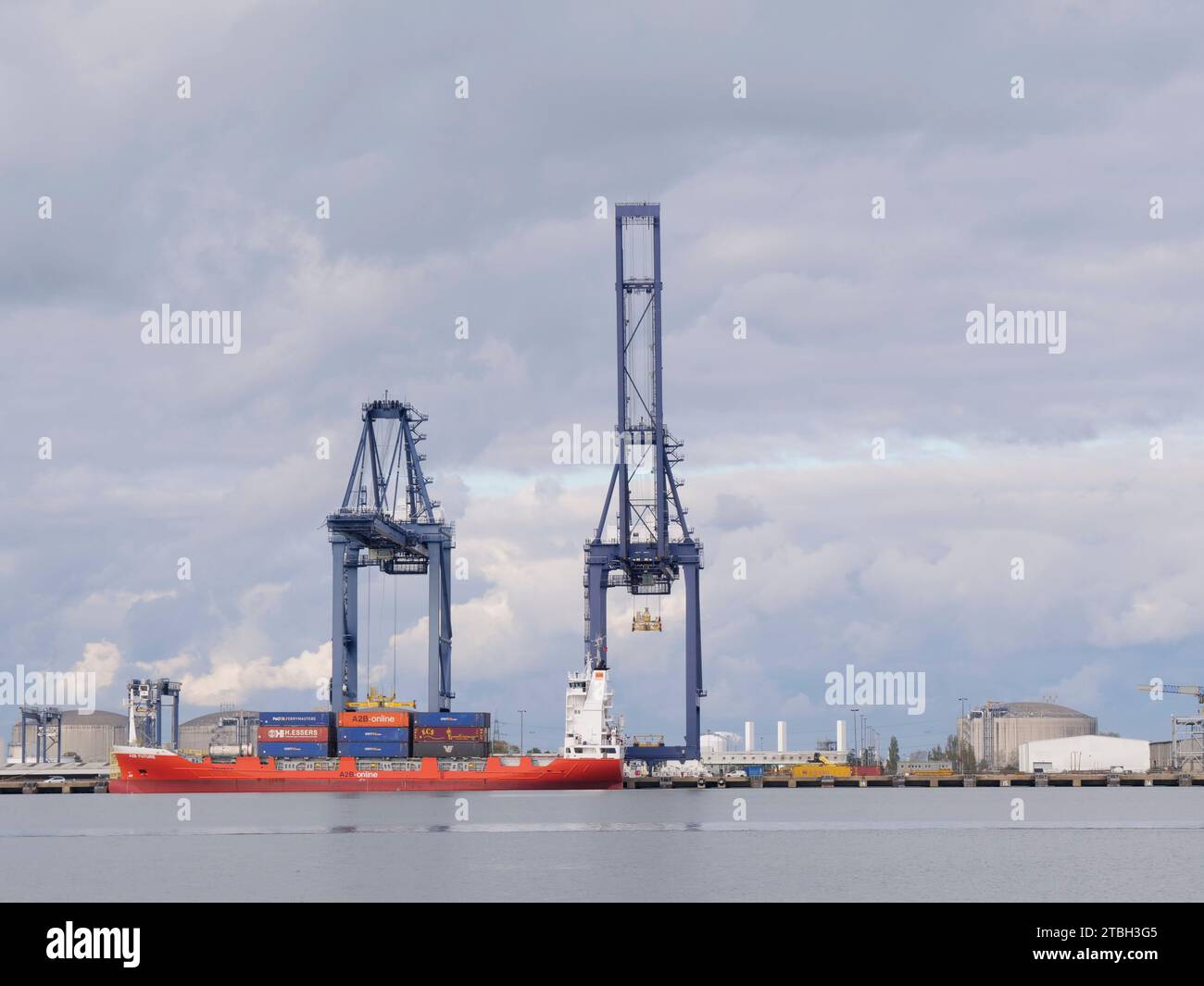 A Small container ship moored at Thames Port on the River Medway in ...