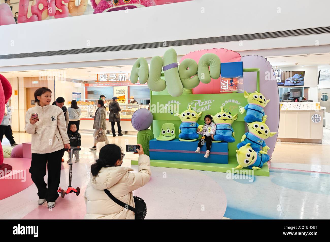 SHANGHAI, CHINA - DECEMBER 7, 2023 - Visitors shop for Disney IP ...