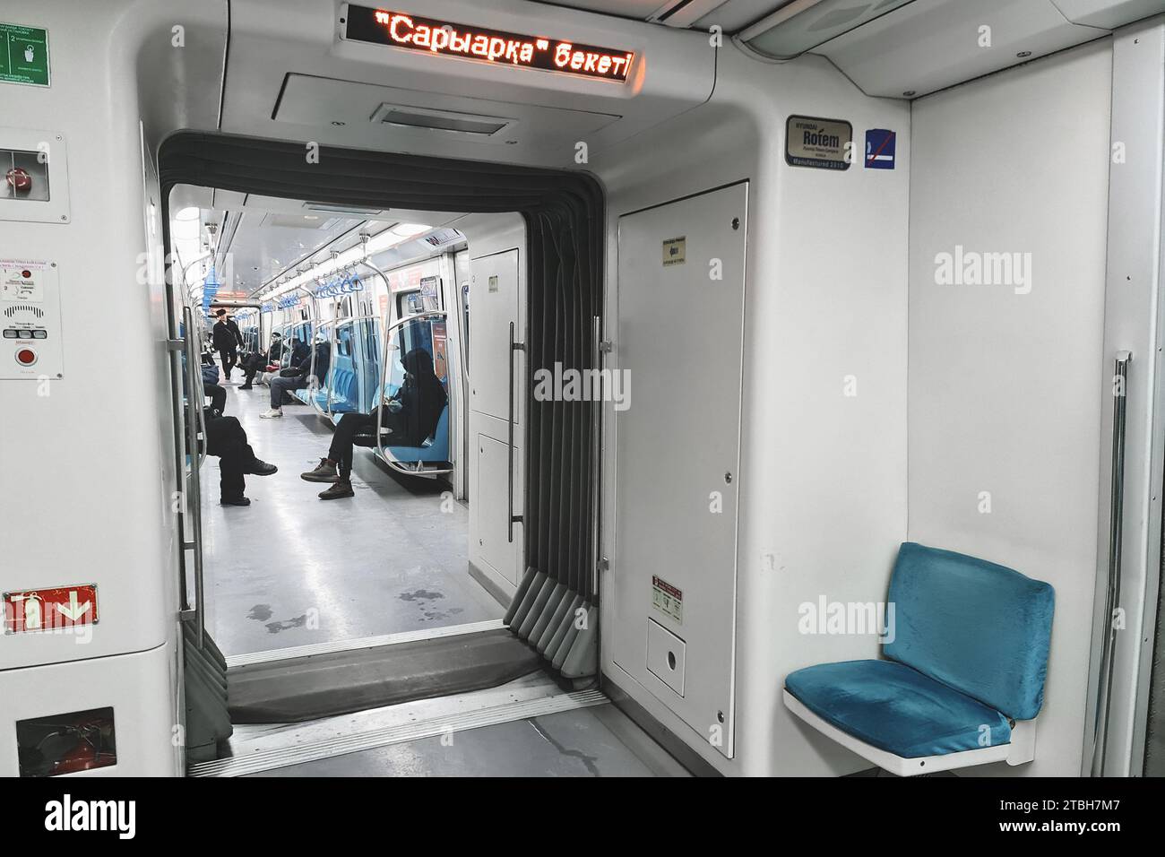 People travel on a train in the Almaty metro Stock Photo - Alamy