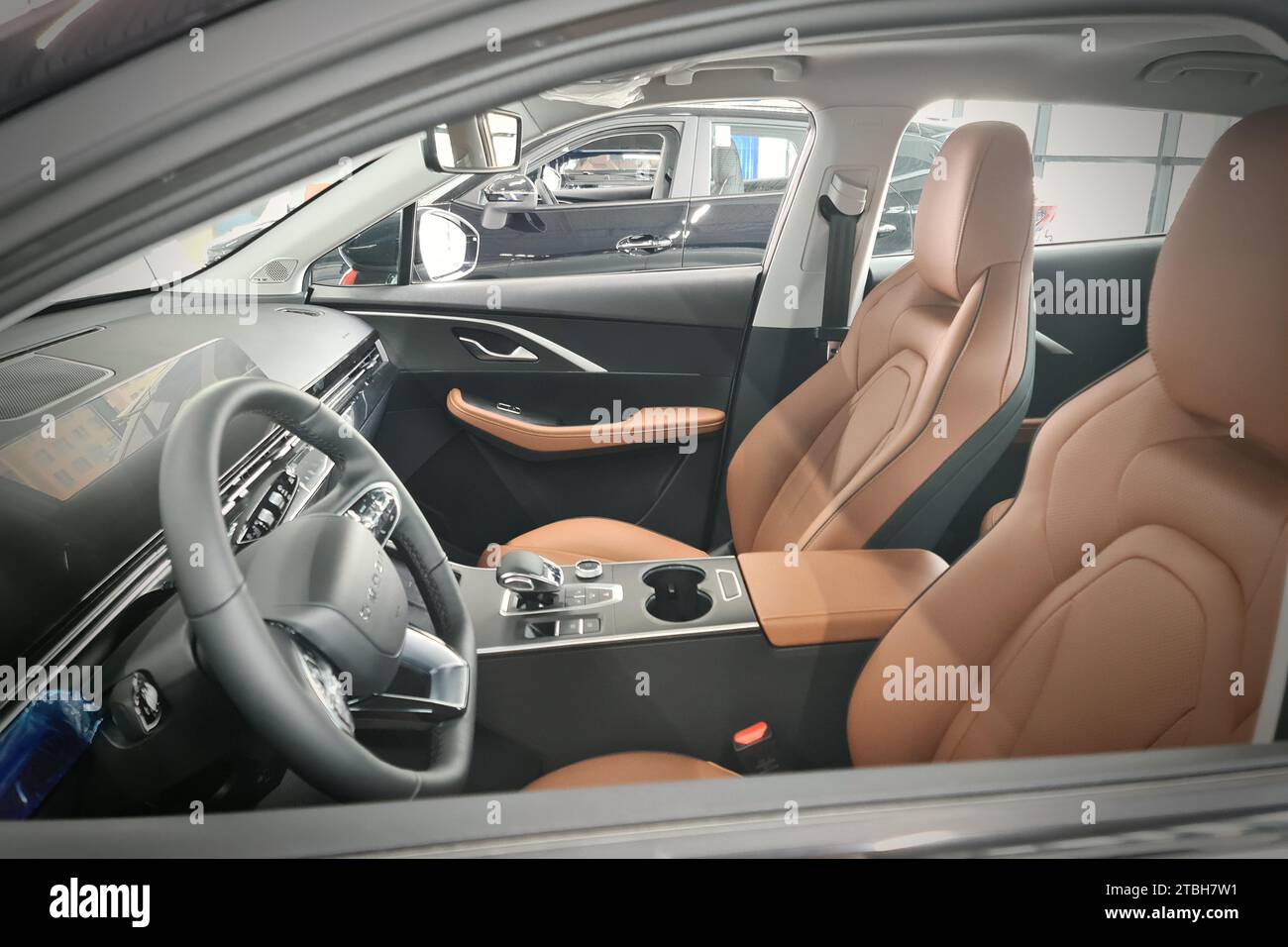 View through the window of the interior of a new Chinese OMODA C5 car ...