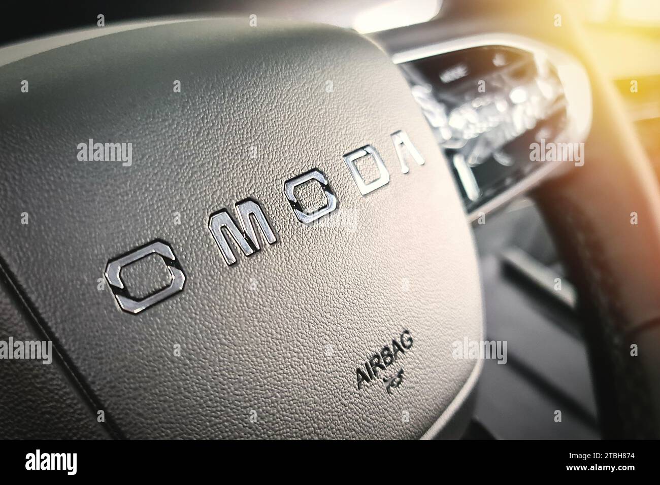 Close-up of the OMODA inscription on the steering wheel of the new ...