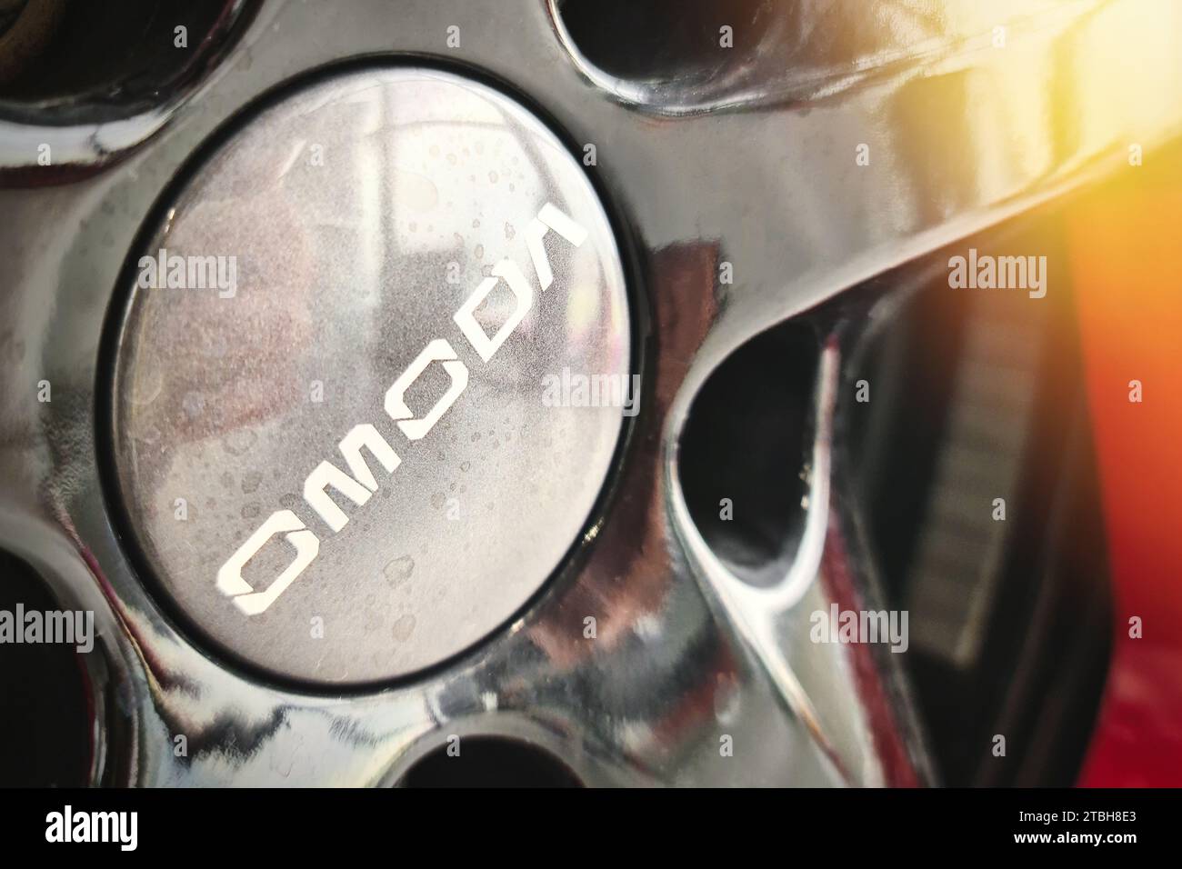 Omoda car name on the alloy wheel of a Chinese car close-up Stock Photo ...