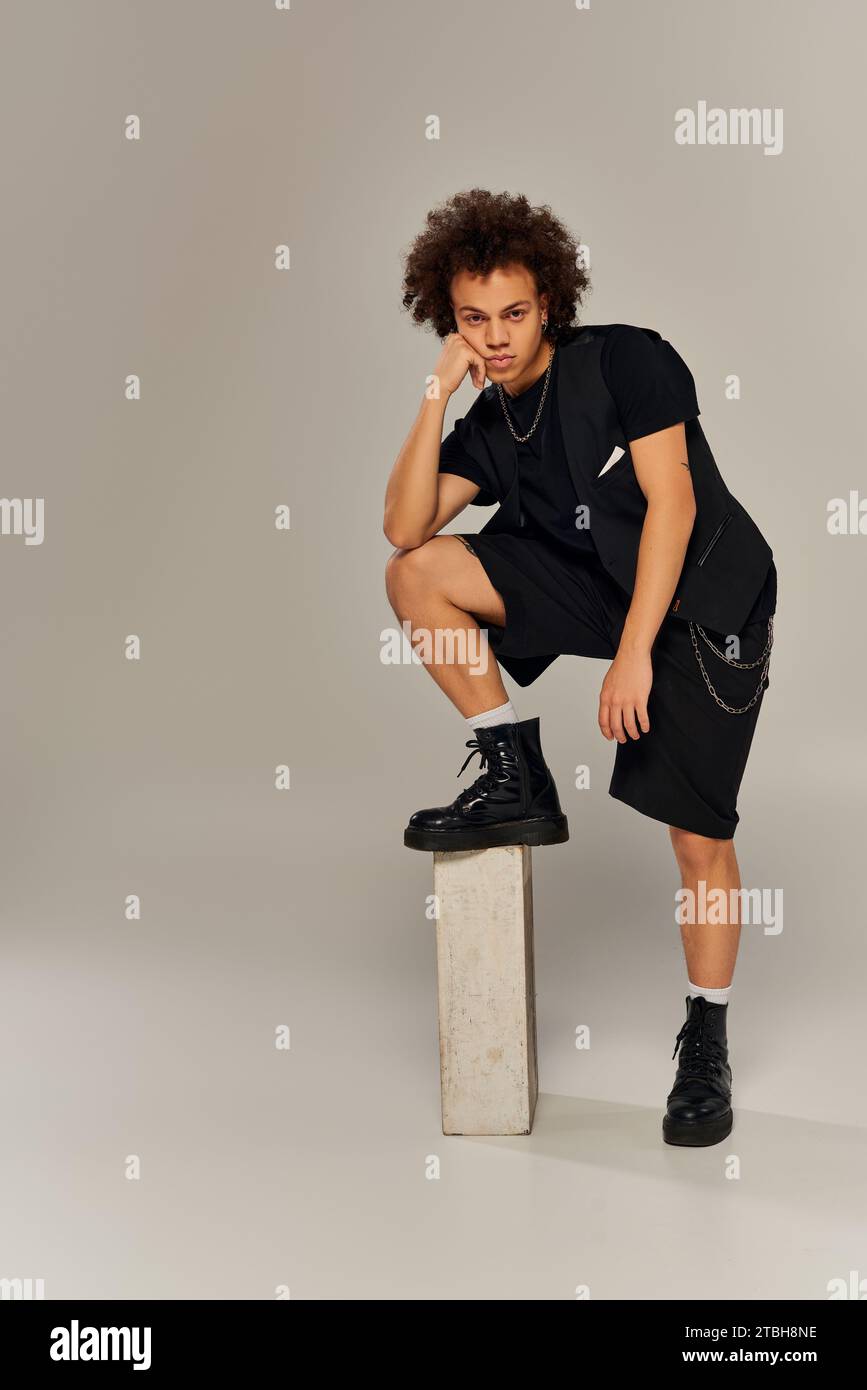 appealing african american male model in black urban stylish attire ...